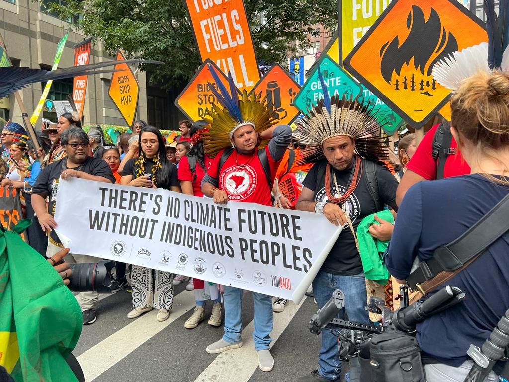Over 75000 Protest in New York at start of NY Climate Week in photos.